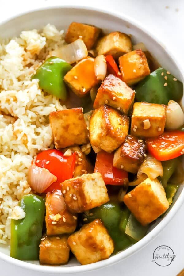 Sweet and Sour Tofu over rice - A Pinch of Healthy
